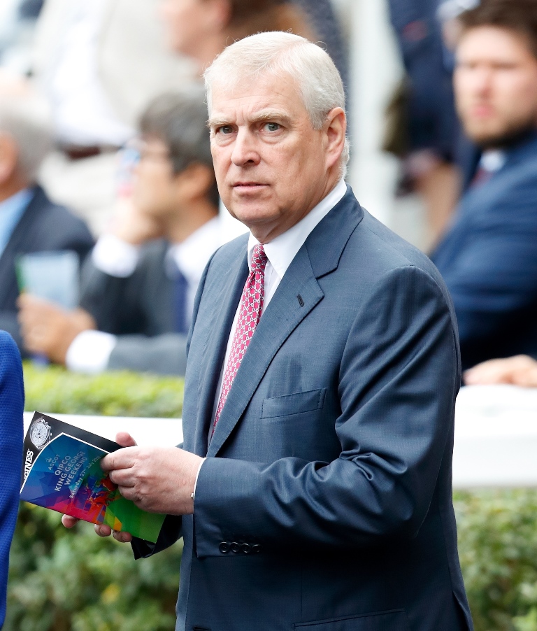 Prince Andrew was seen getting foot massage from young woman alongside ...