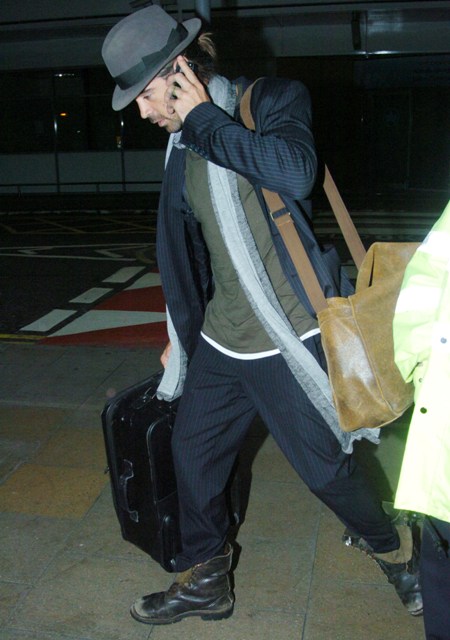 Colin Farrell arriving in London for Christmas with Emma Forrest