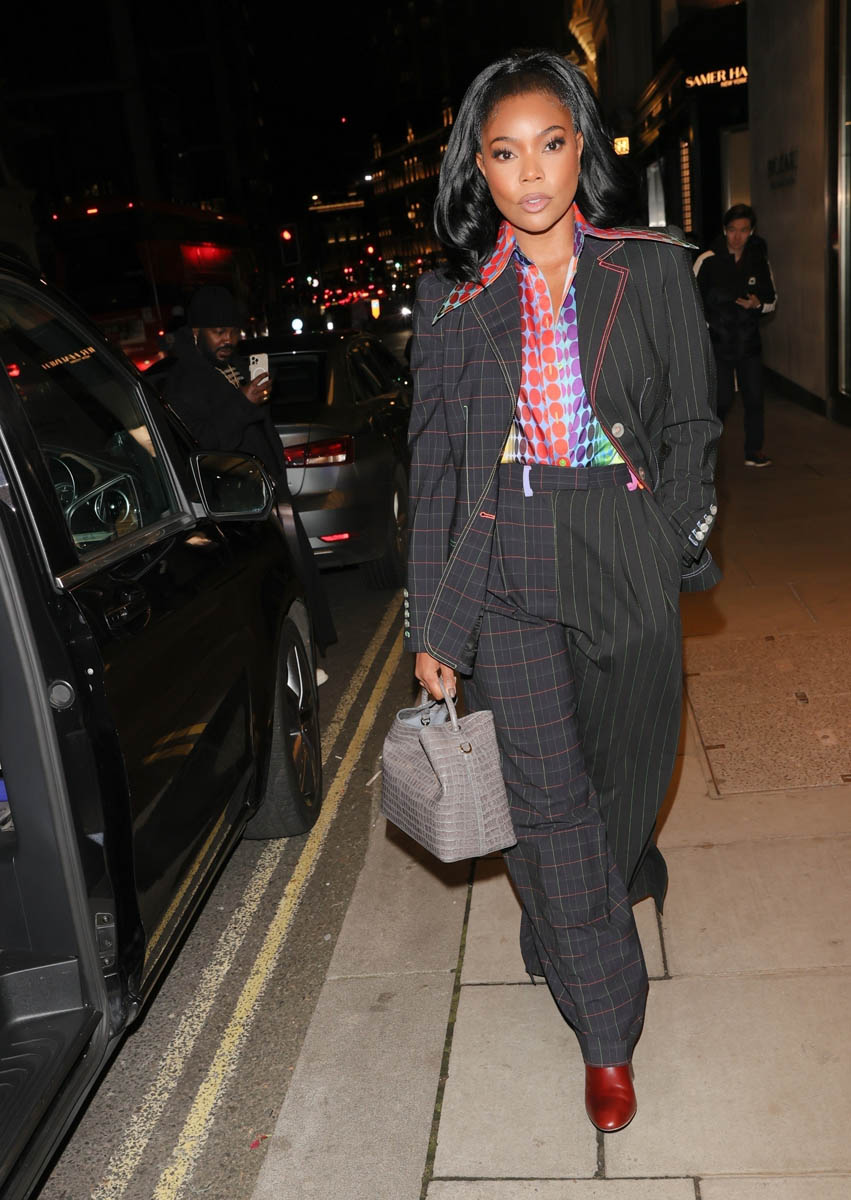 Gabrielle Union was feeling herself in an excellent suit and monochrome red look in London