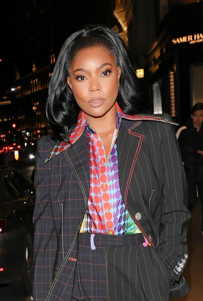 Gabrielle Union was feeling herself in an excellent suit and monochrome red look in London