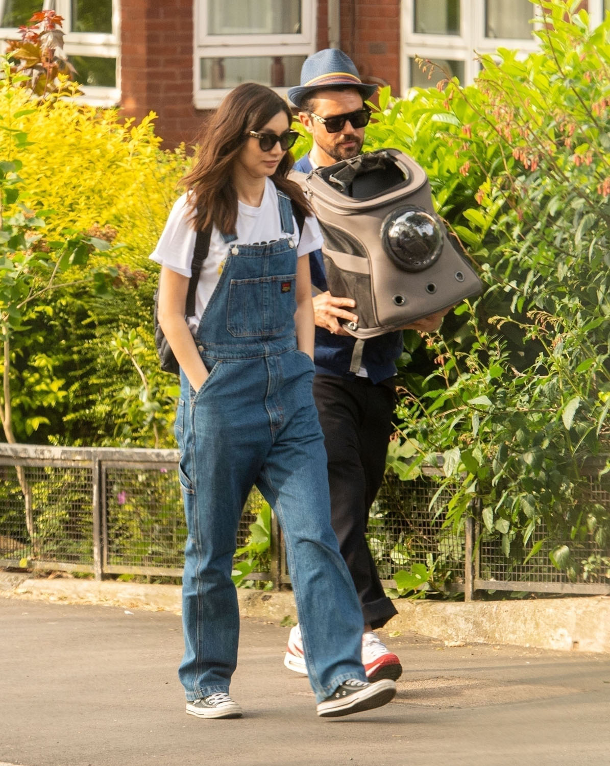 Gemma Chan and Dominic Cooper's cat, Mr. Kitty, enjoys some fresh air ...