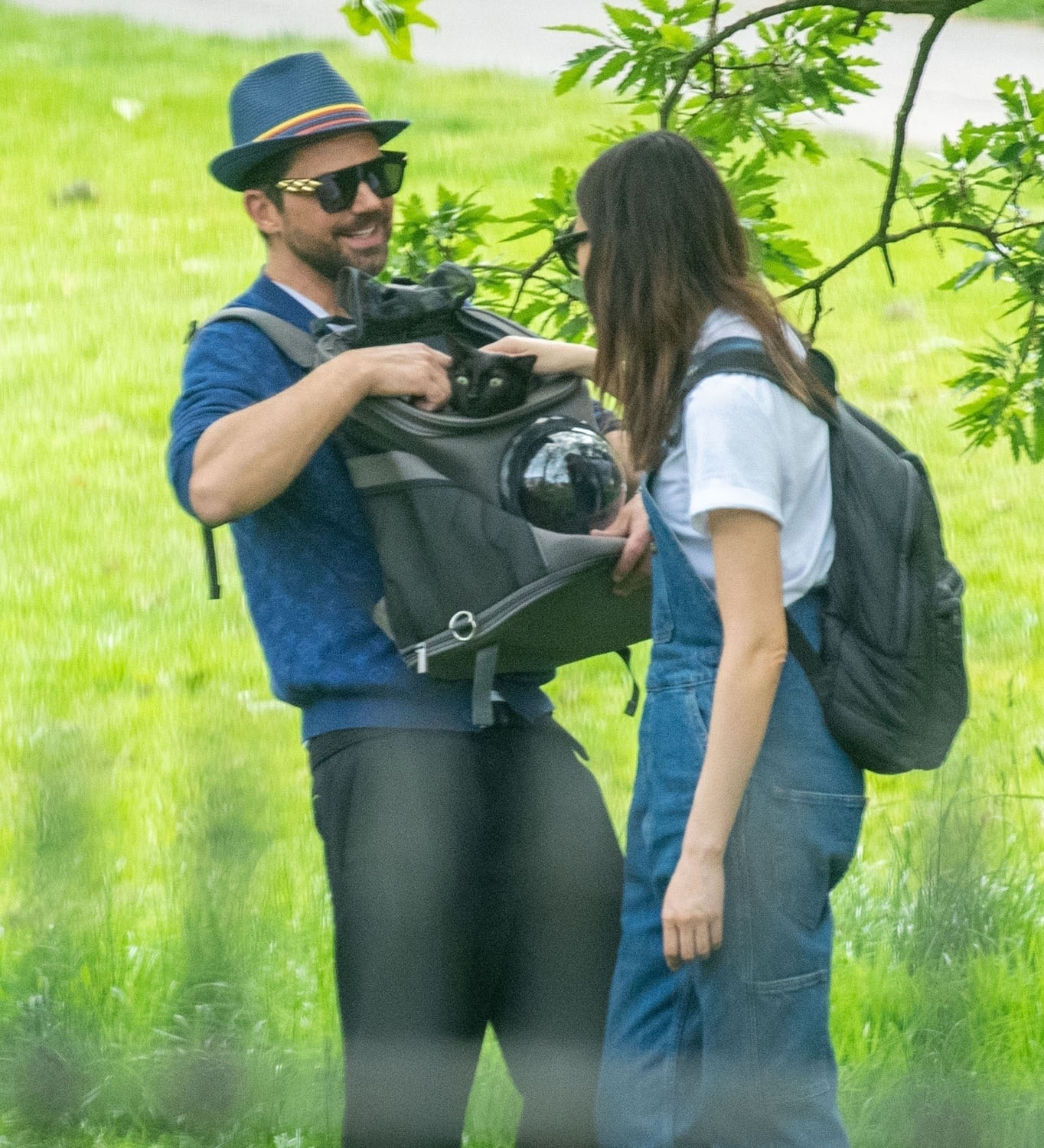 Gemma Chan and Dominic Cooper's cat, Mr. Kitty, enjoys some fresh air ...