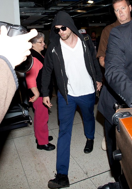 Robert Pattinson has a lot of baggage at LAX