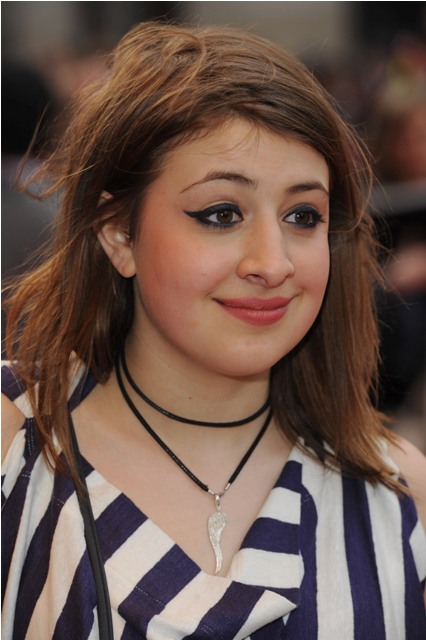 Rupert Grint holding hands with Georgia Groome 25apr11