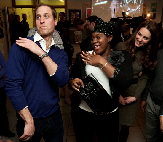 Prince William busts a move for Catherine at charity visit